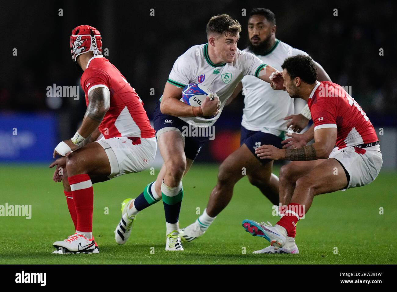 Ireland's Garry Ringrose runs at Tonga's William Havili, right, during ...