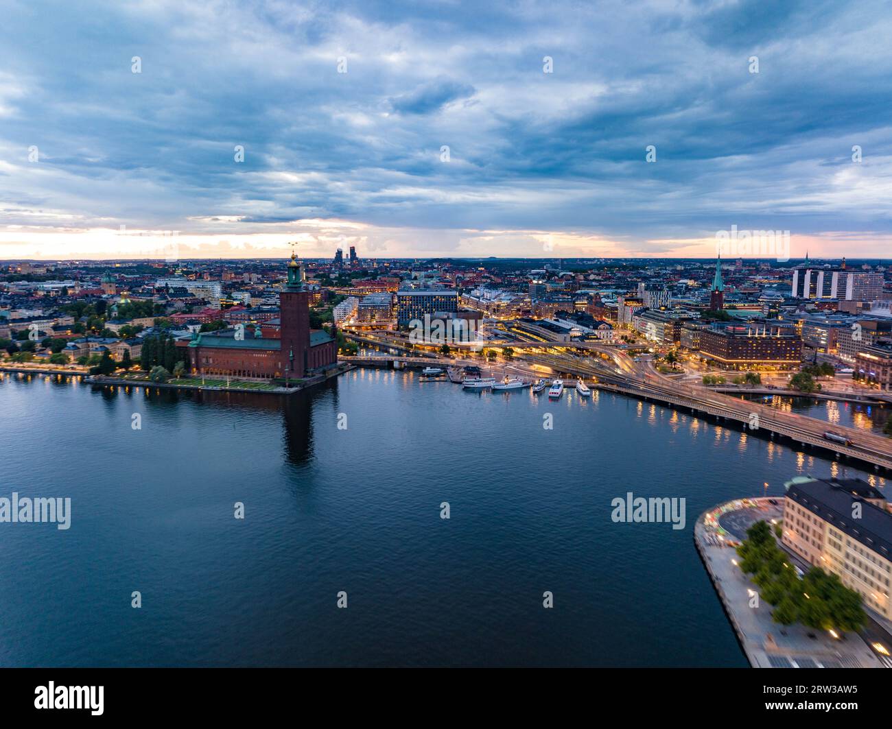 Aerial view of evening city. Transport infrastructure and popular ...