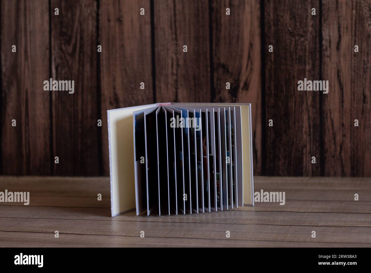 a modern photo book. photo album of photos on a beautiful background ...