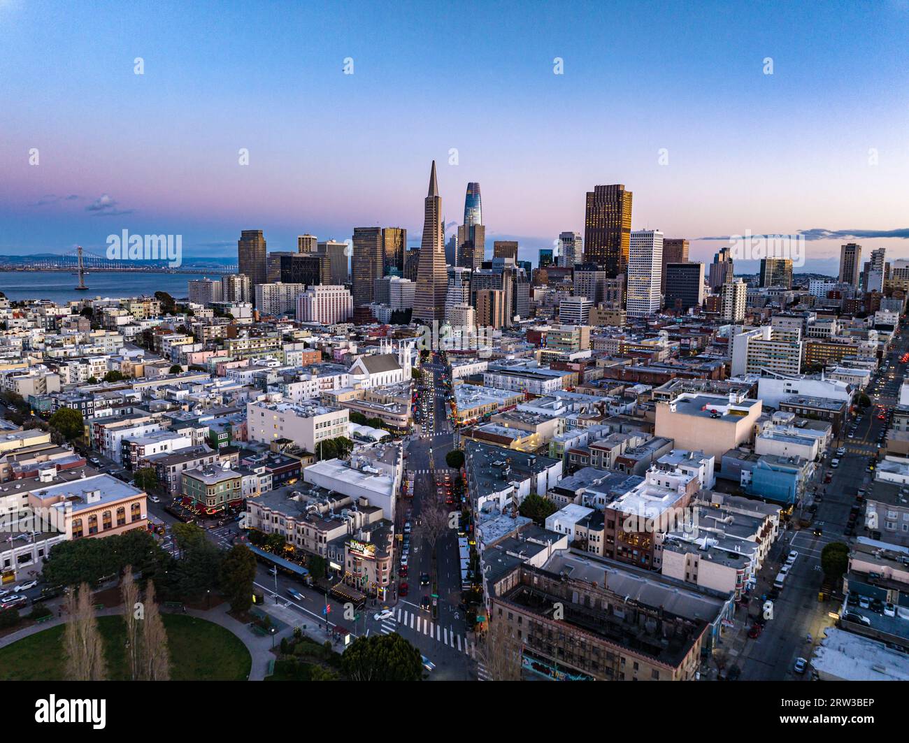 Skyline at twilight. Aerial view of buildings in metropolis, downtown ...