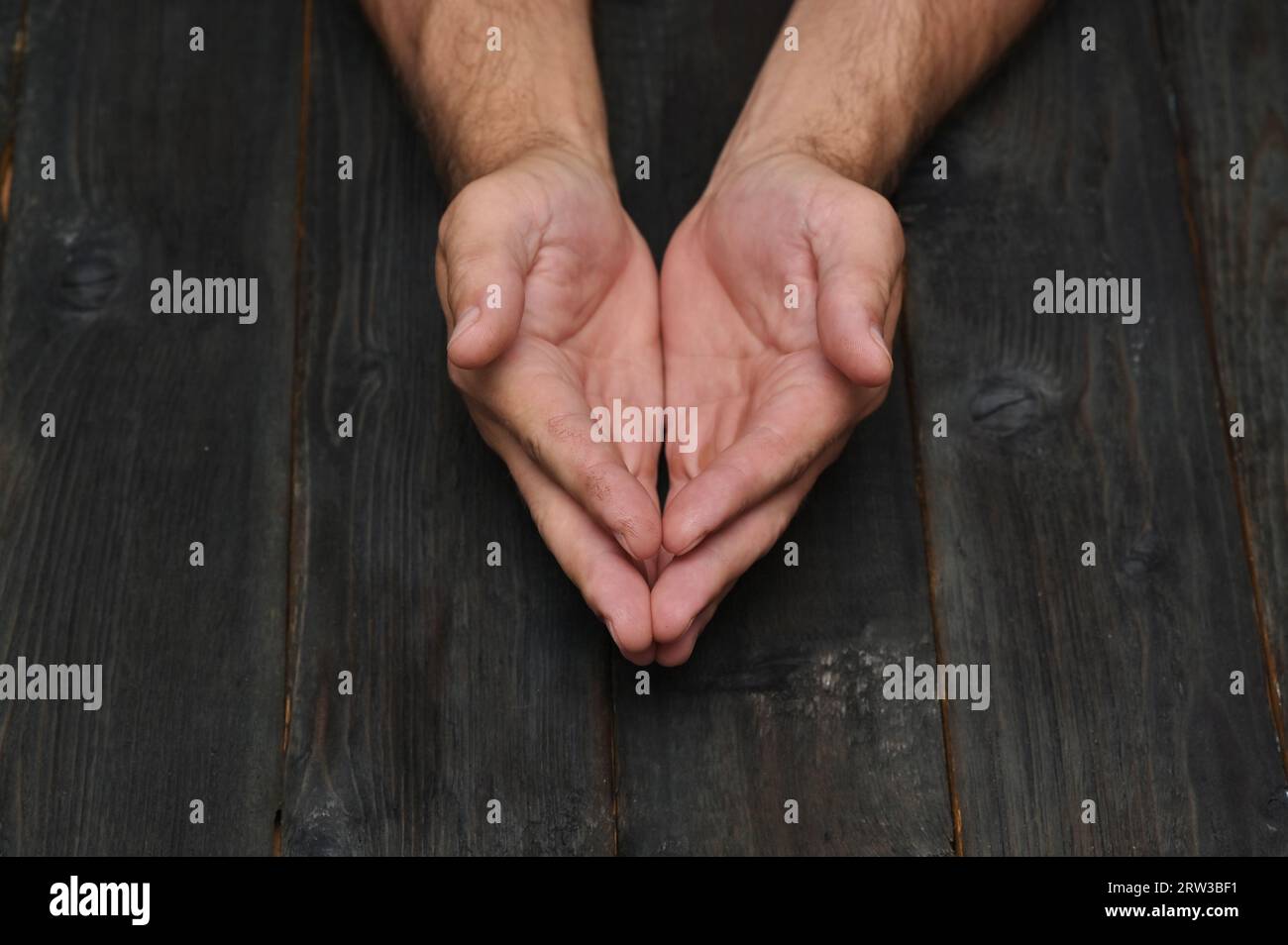 Hands interlocked hi-res stock photography and images - Alamy