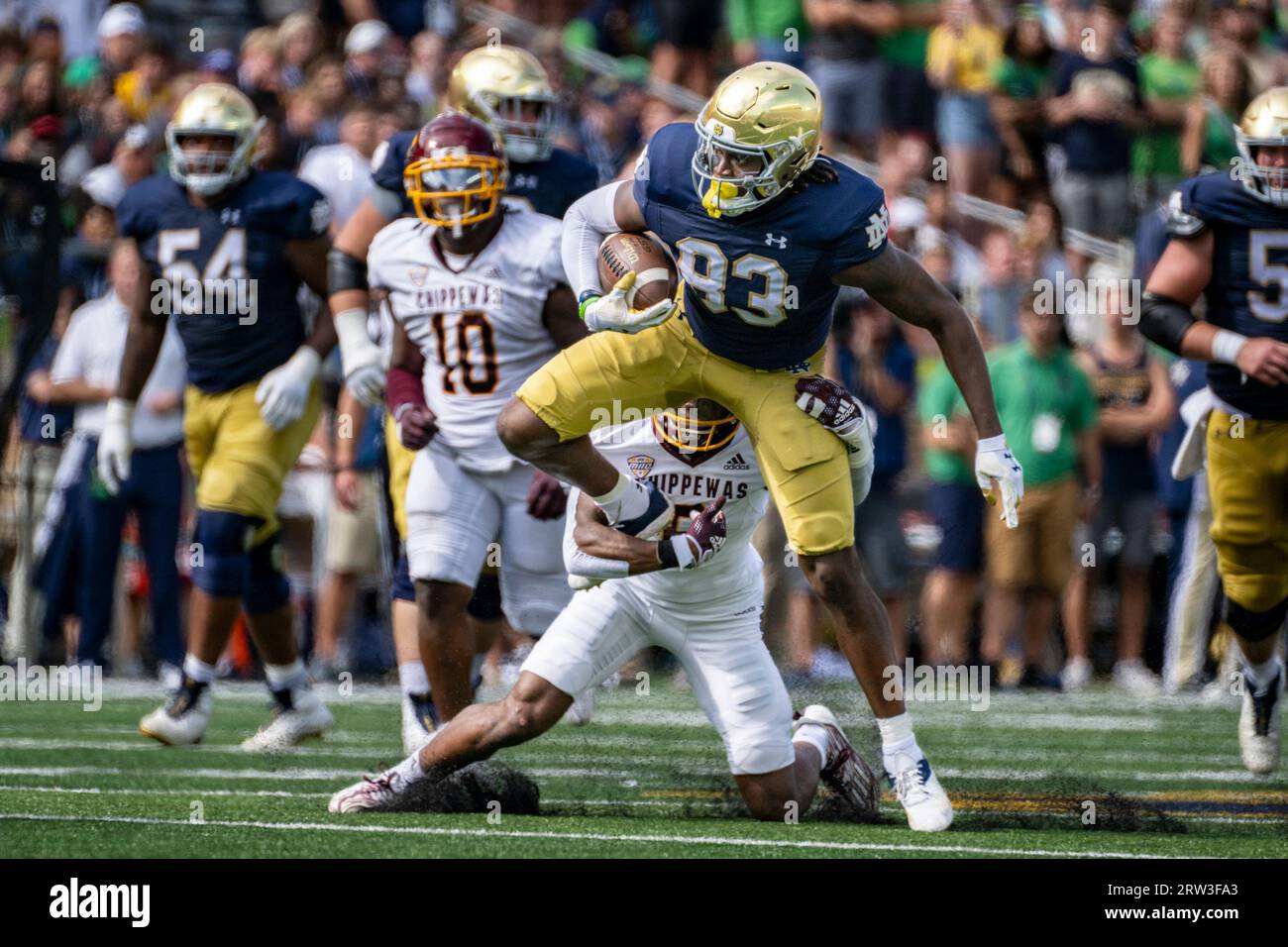 Central Michigan defensive back Lavario Wiley (6) works to bring down ...