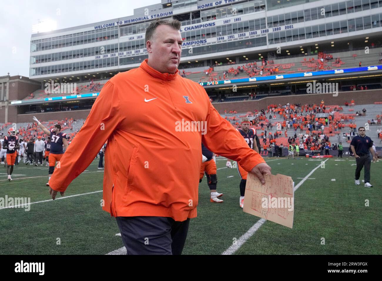 Illinois head coach Bret Bielema walks off the field after his team's ...