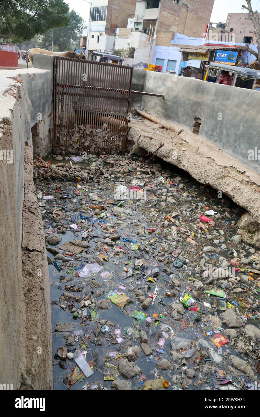 City river covered of rubbish that floating in the water surface Stock ...