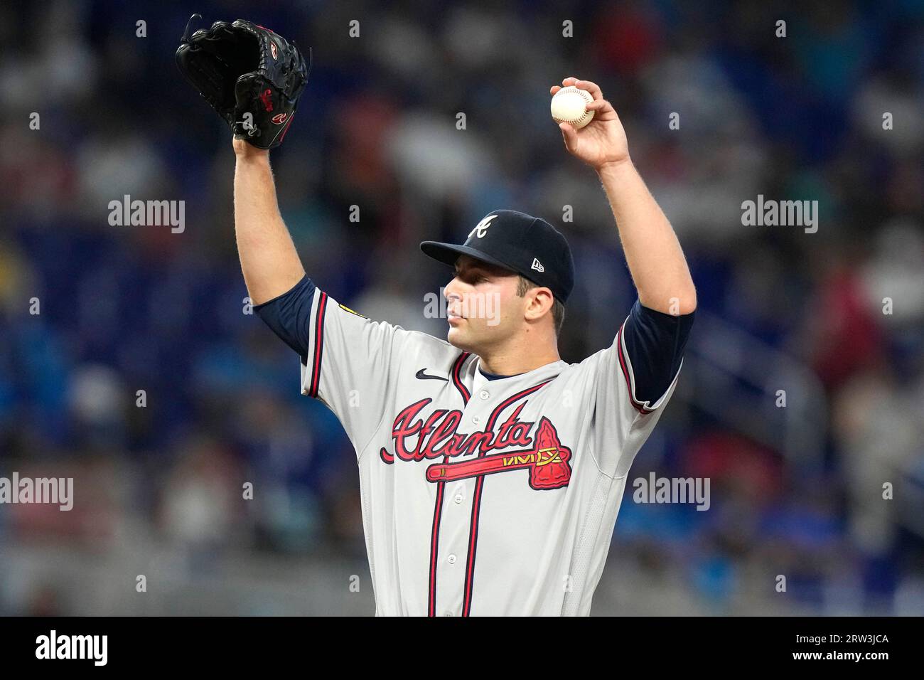 Atlanta Braves starting pitcher Jared Shuster stretches on the mound ...