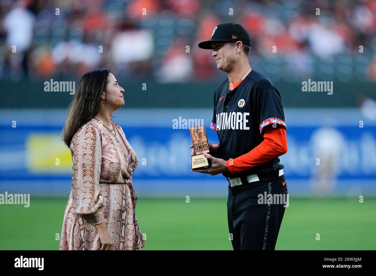 Baltimore Orioles starting pitcher Kyle Gibson, right, receives the ...
