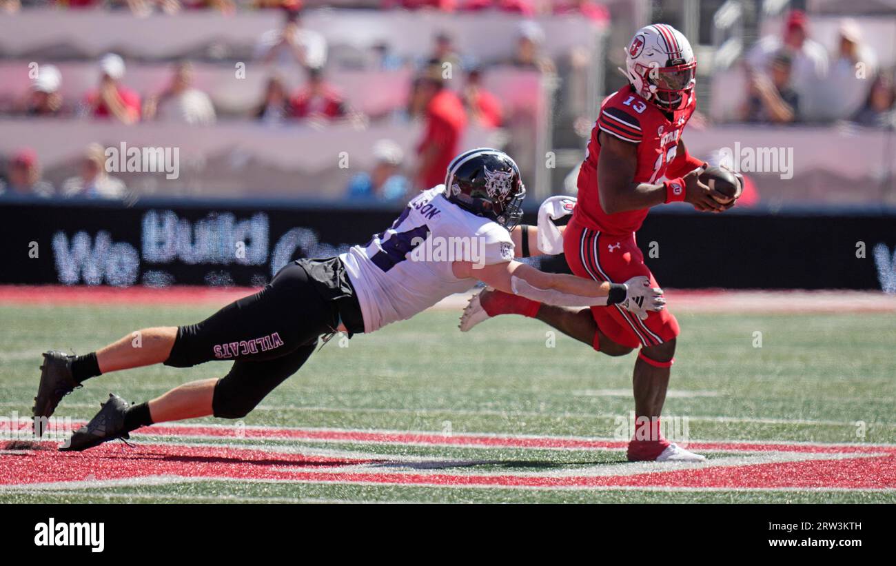 Utah quarterback Nate Johnson (13) breaks free from Weber State ...