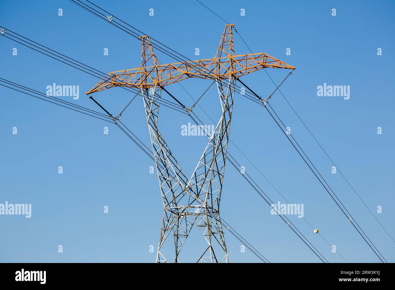 Symmetrical high voltage electricity poles in Turkey Stock Photo - Alamy