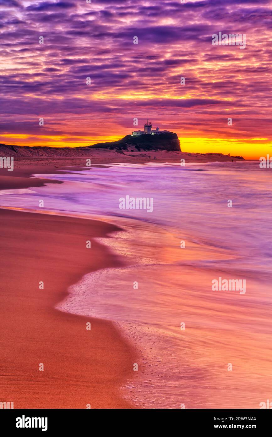 Pink majestic sunrise over Nobbys beach in Newcastle city of Australia ...