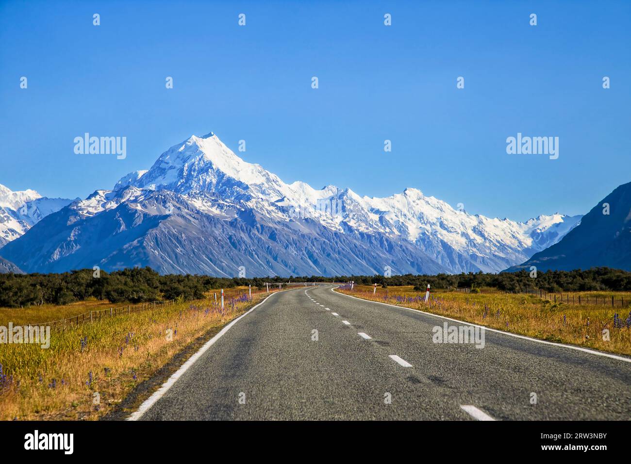 Driving to Mt Cook majesting rocky ranges in New Zealand on Highway 80 - popular tourism ...