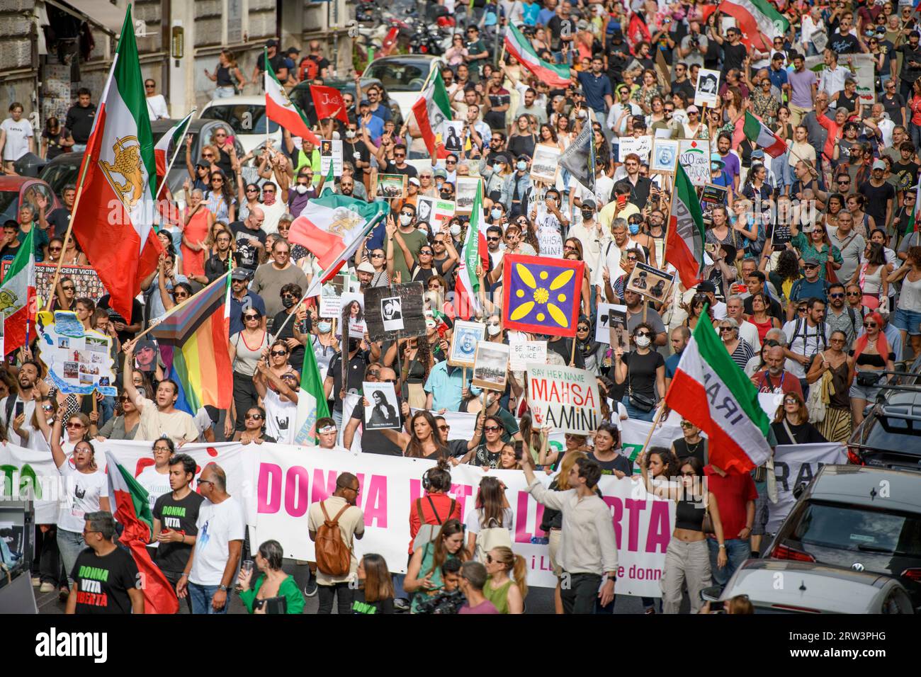 Rome, Italy. 16th Sep, 2023. Women and men with Iranian flags march ...