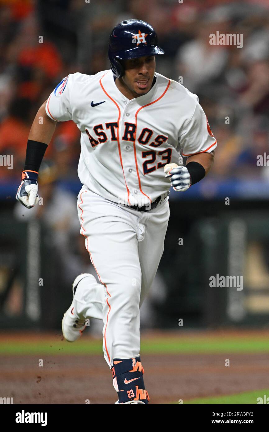 Houston Astros designated hitter Michael Brantley (23) hits a single to ...