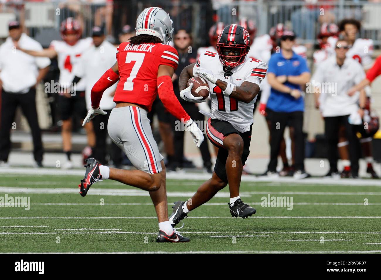 Western Kentucky receiver Malachi Corley, right, runs after a catch as ...