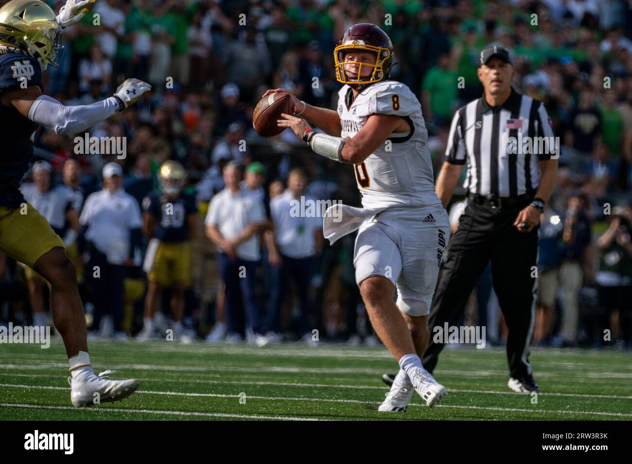 Central Michigan quarterback Jase Bauer (8) looks for a receiver during ...