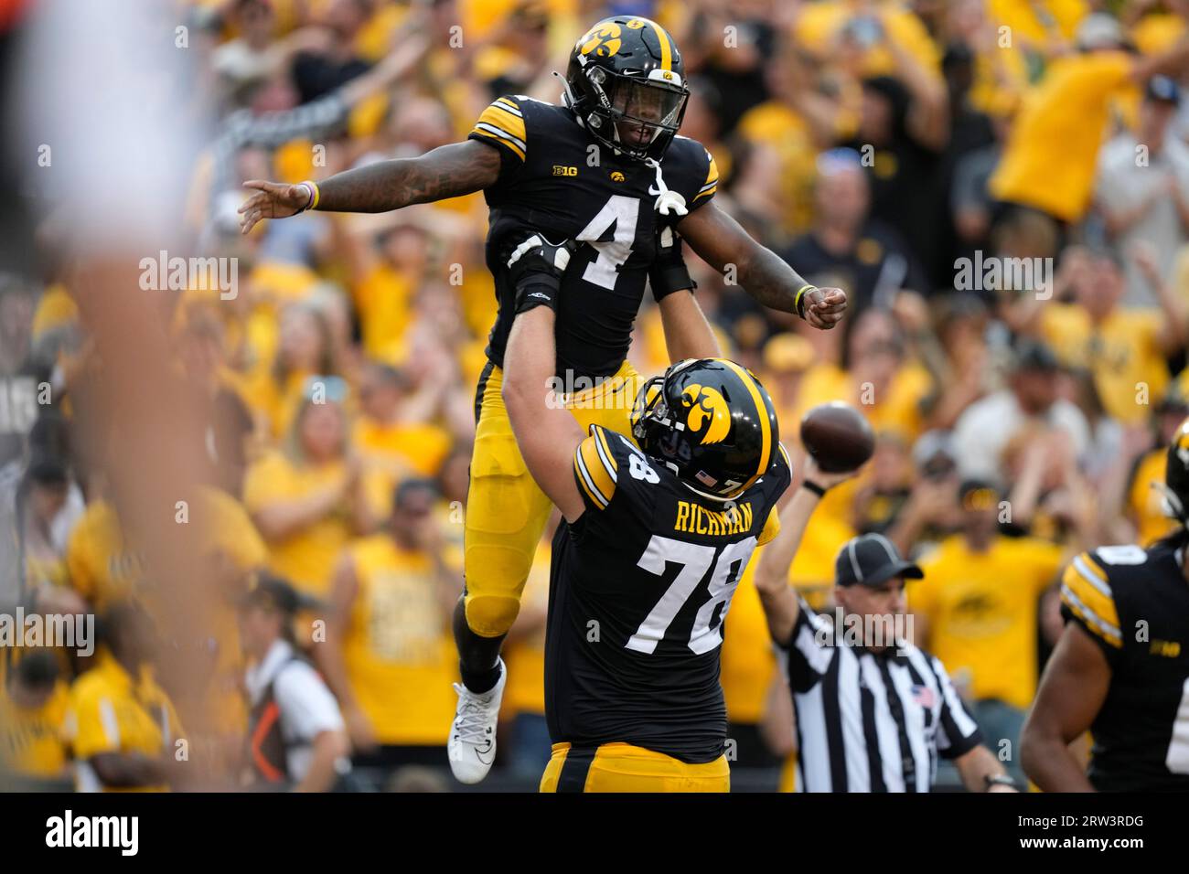 Iowa running back Leshon Williams (4) celebrates with teammate ...