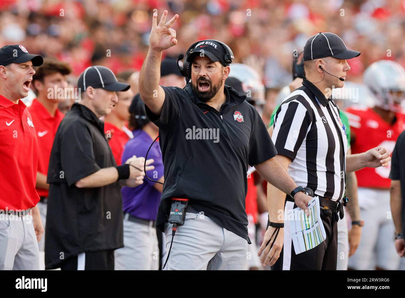 Ohio State head coach Ryan Day instructs his team against and Western ...