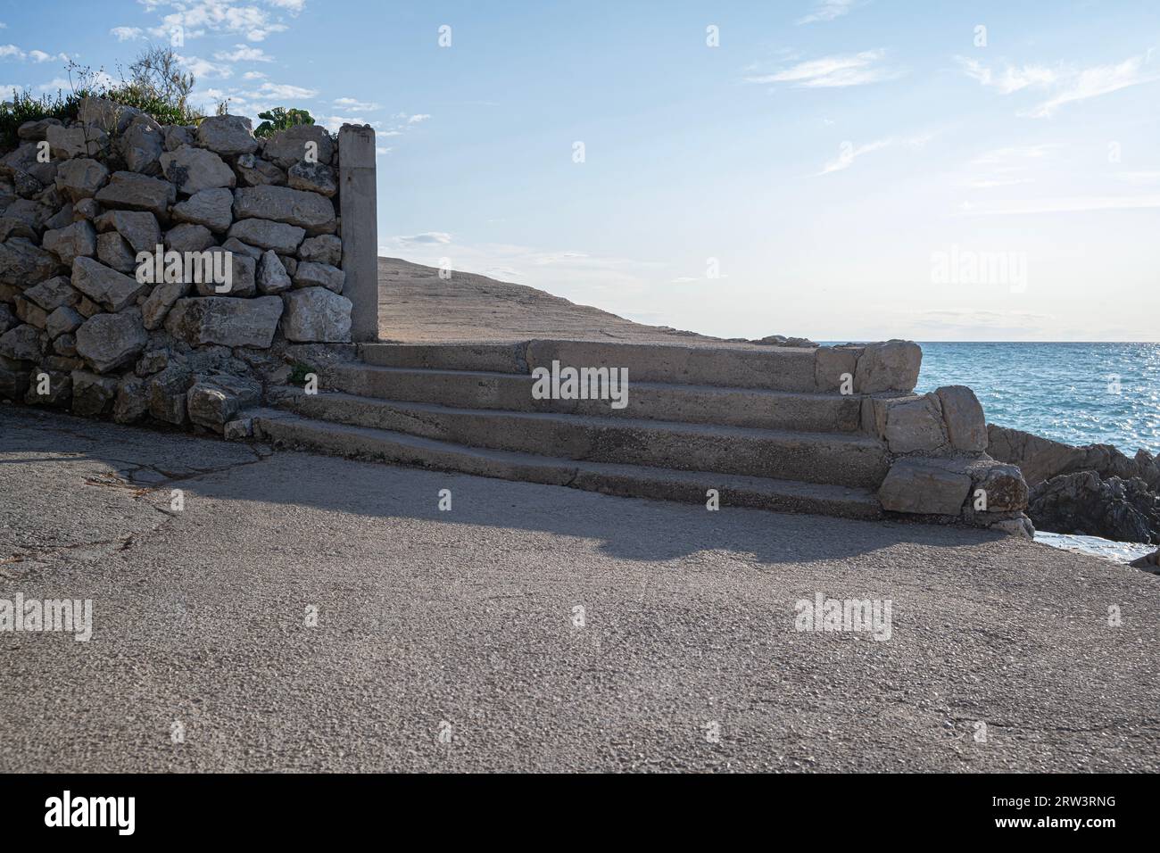 Stone steps on the seashore Stock Photo - Alamy