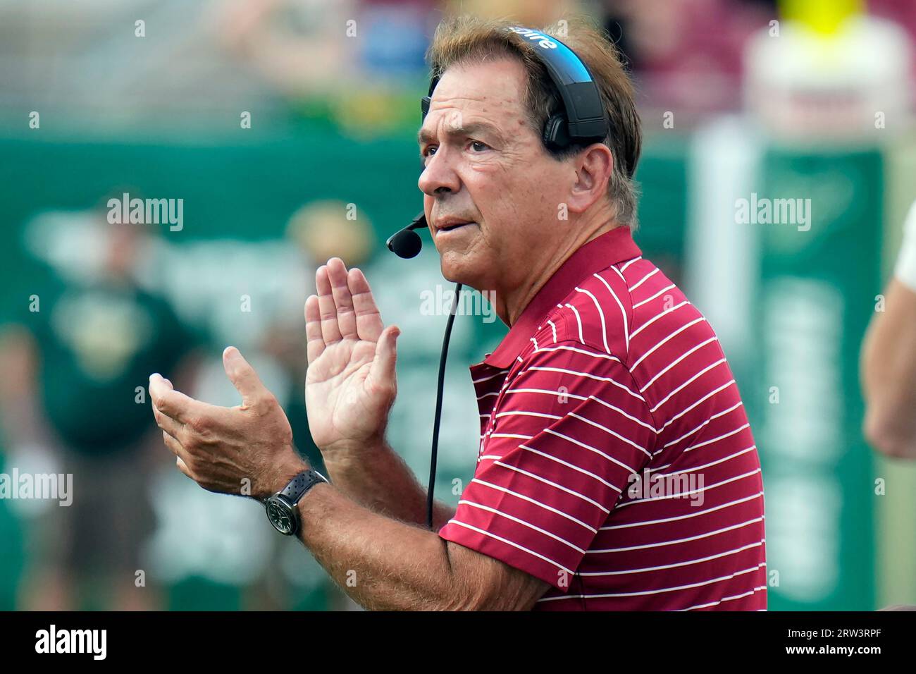 Alabama head coach Nick Saban claps during the first half of an NCAA ...