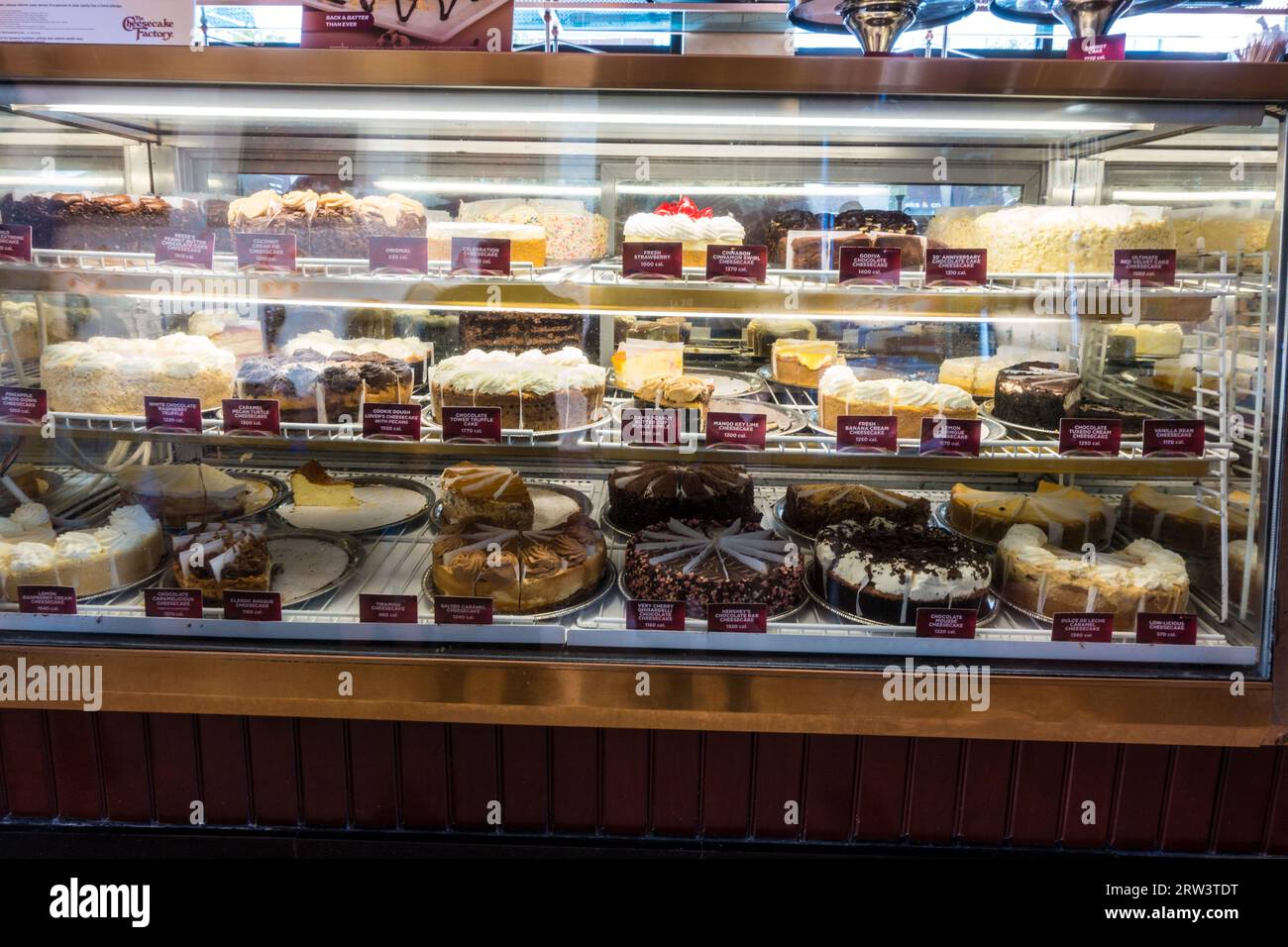Variety of Cheese cakes on display in Cheesecake factory restaurant ...