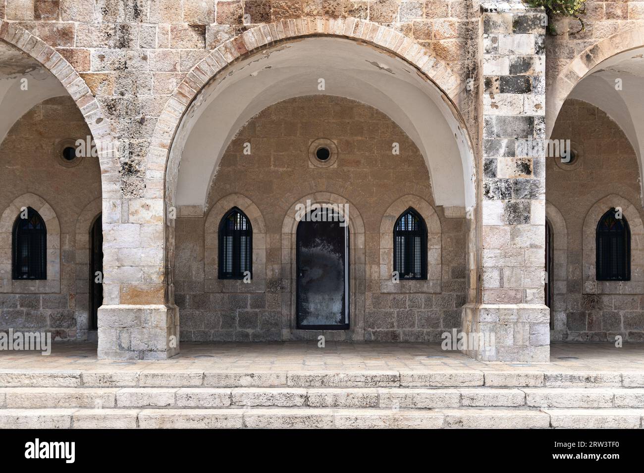 Ancient building in Jerusalem with arches and pillars Stock Photo - Alamy