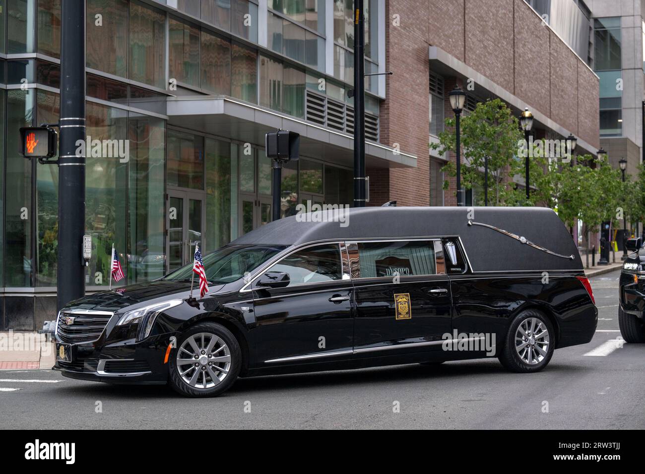 A hearse carrying the body of Hartford Police Detective Robert "Bobby ...