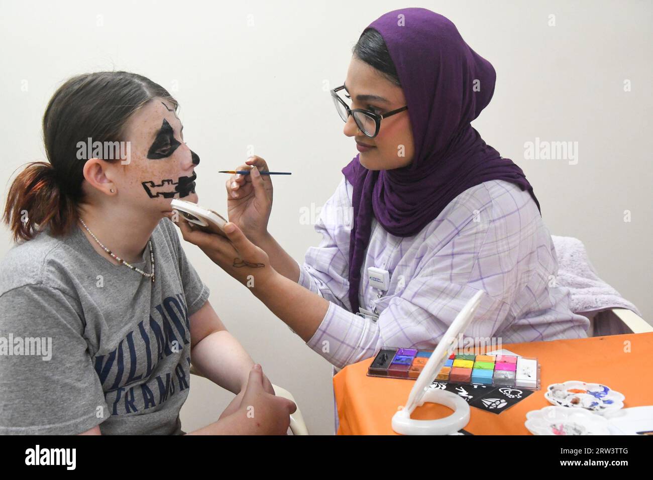Dalilah Werner-Huth, of Pottsville, Pa., has her face painted by Dr ...
