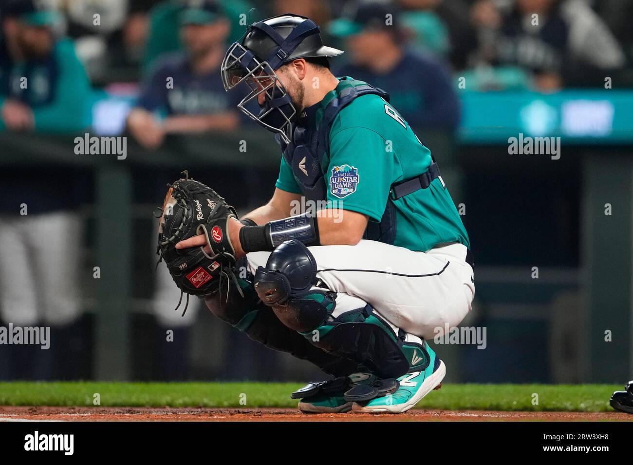 Seattle Mariners catcher Cal Raleigh waits in between batters in a ...
