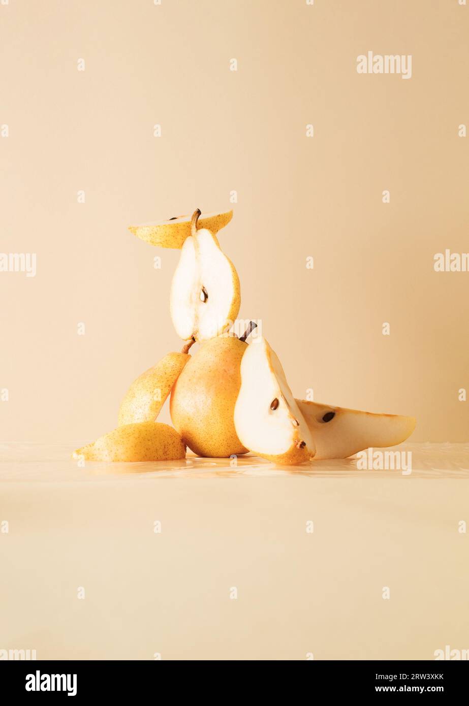 Composition of pears on a beige background. Creative fruit food concept ...