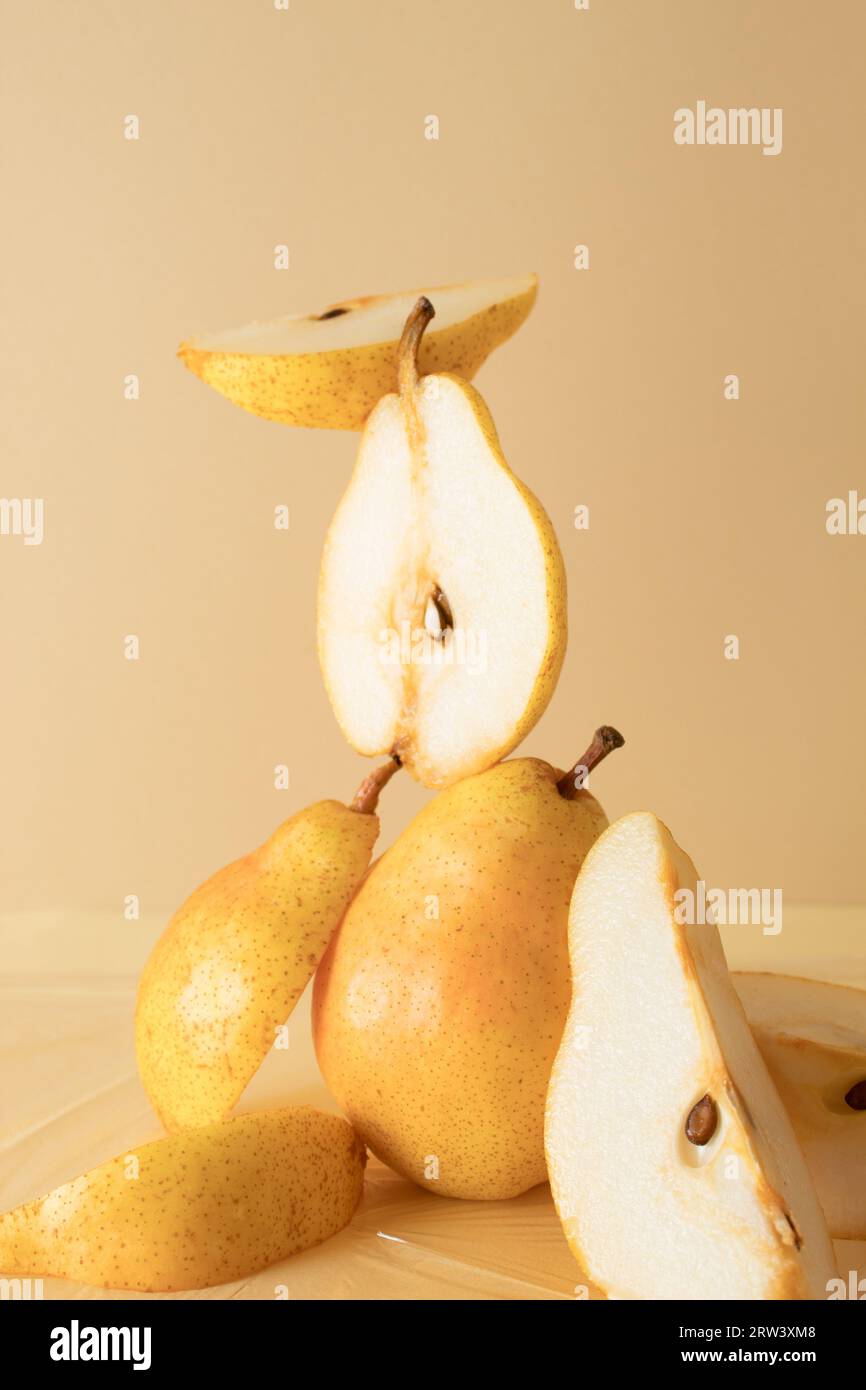 Composition of pears on a beige background. Creative fruit food concept ...