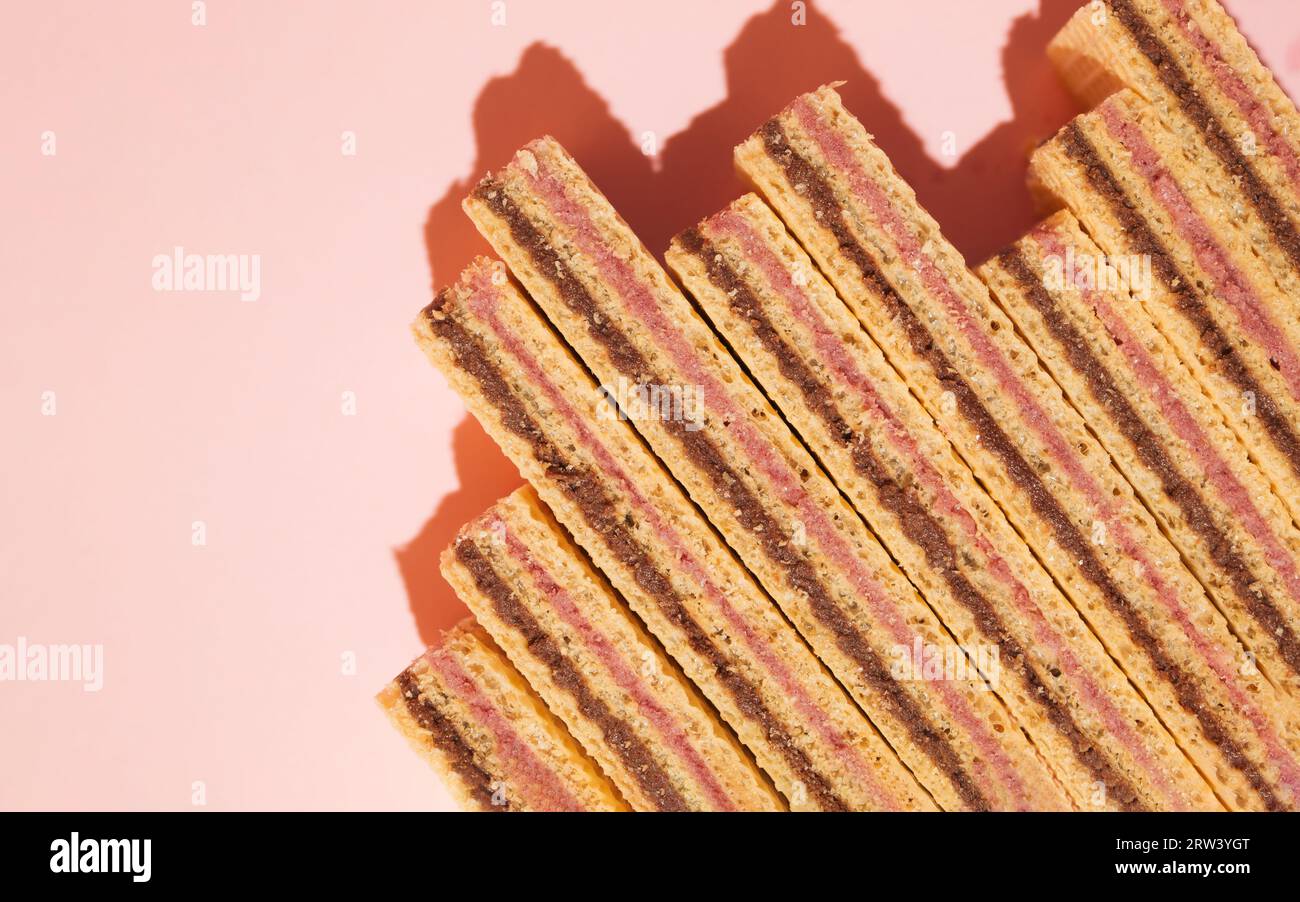 Wafer texture with raspberry and cocoa filling Stock Photo - Alamy