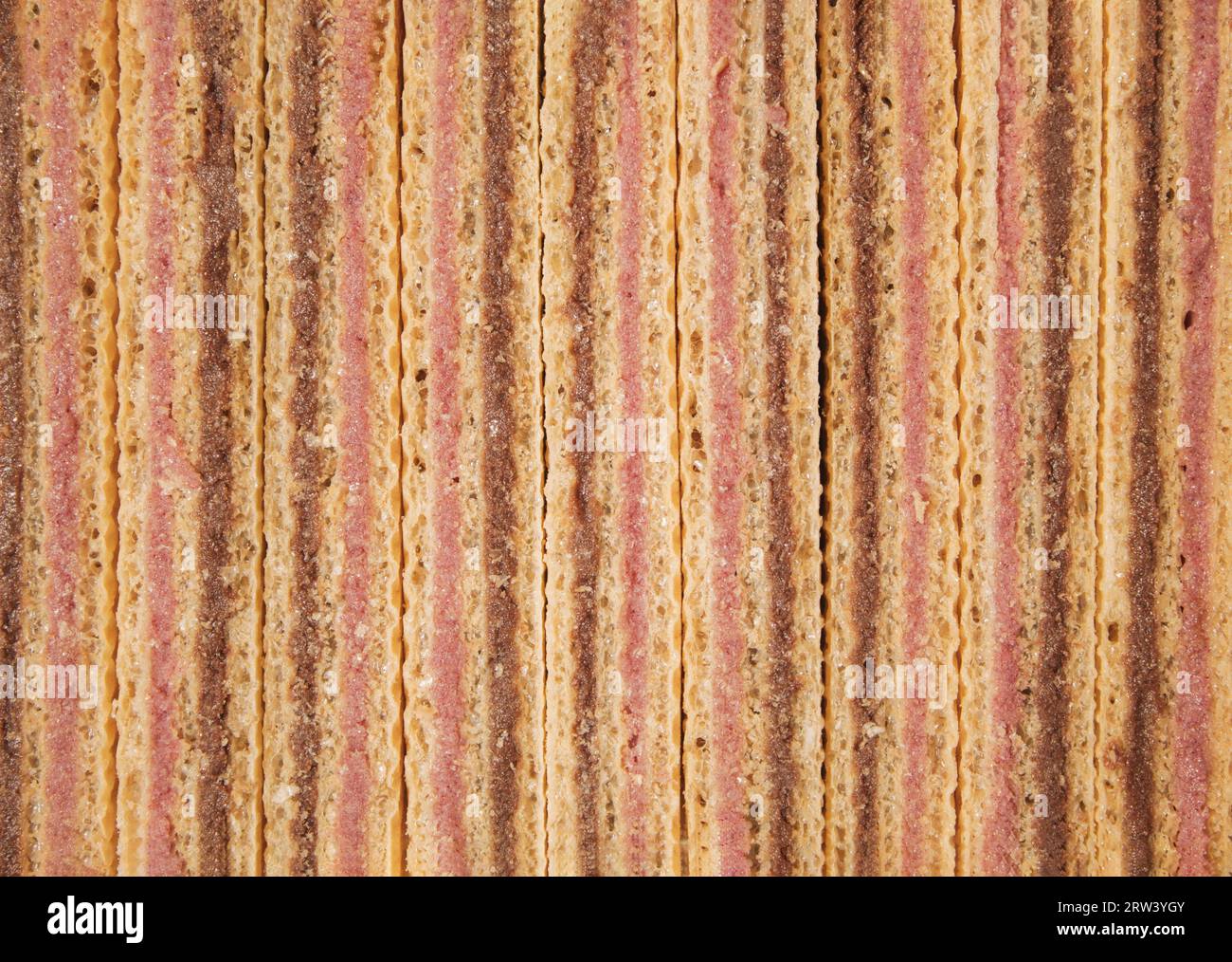 Wafer texture with raspberry and cocoa filling Stock Photo - Alamy