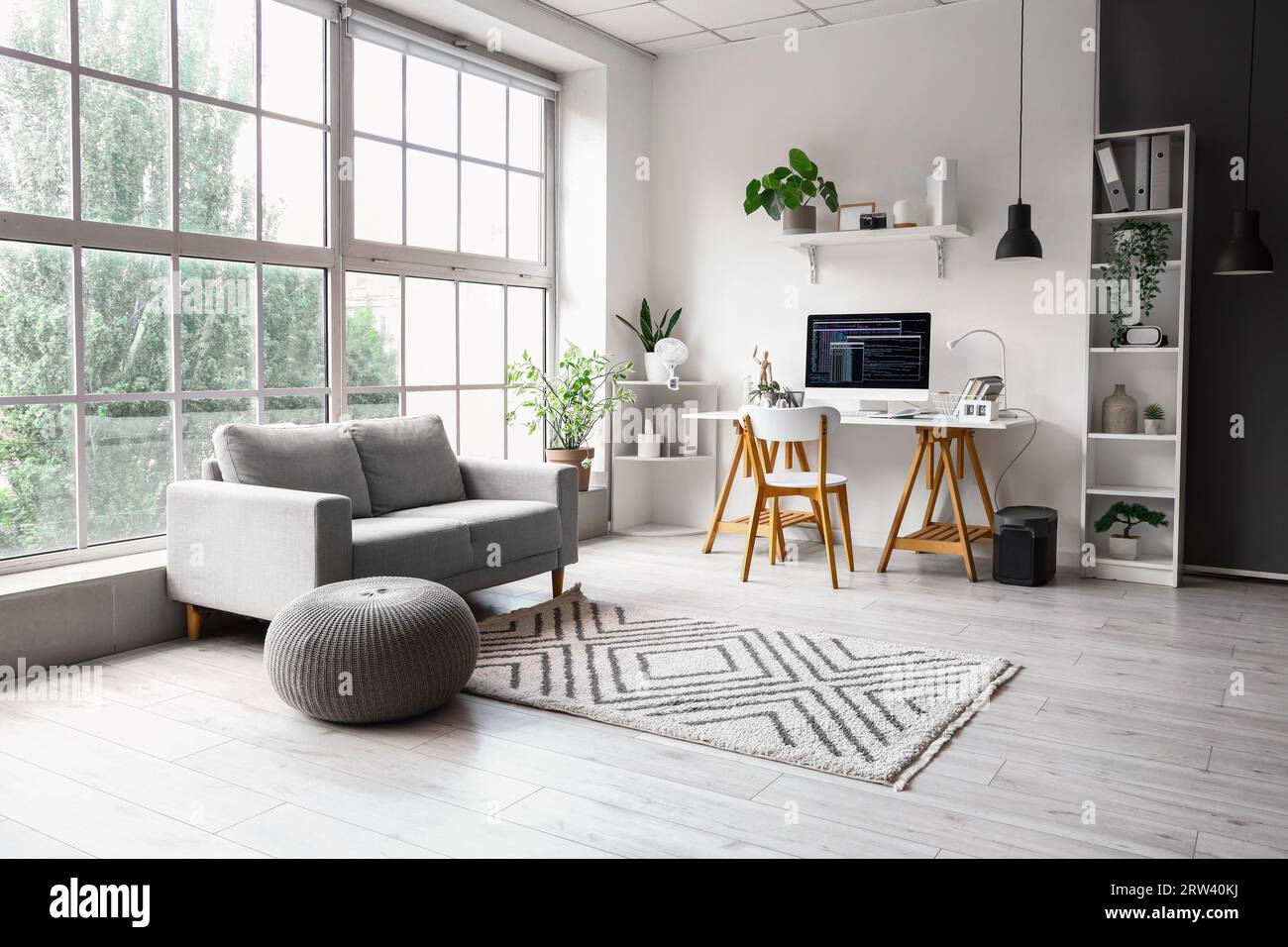 Interior of office with programmer's workplace and sofa Stock Photo - Alamy