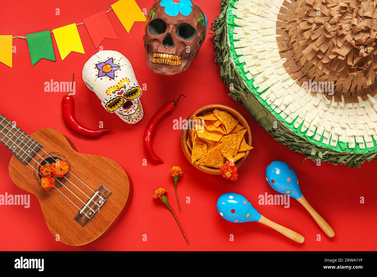 Composition with Mexican symbols and food for Independence Day on red ...
