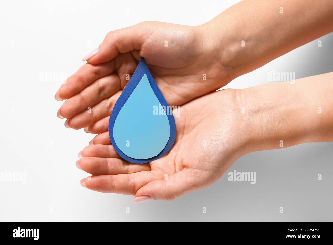 Female hands with paper drops on white background. World Polio Day ...