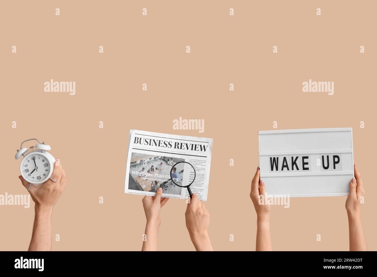 Hands holding alarm clock, newspaper, magnifier and board with text ...