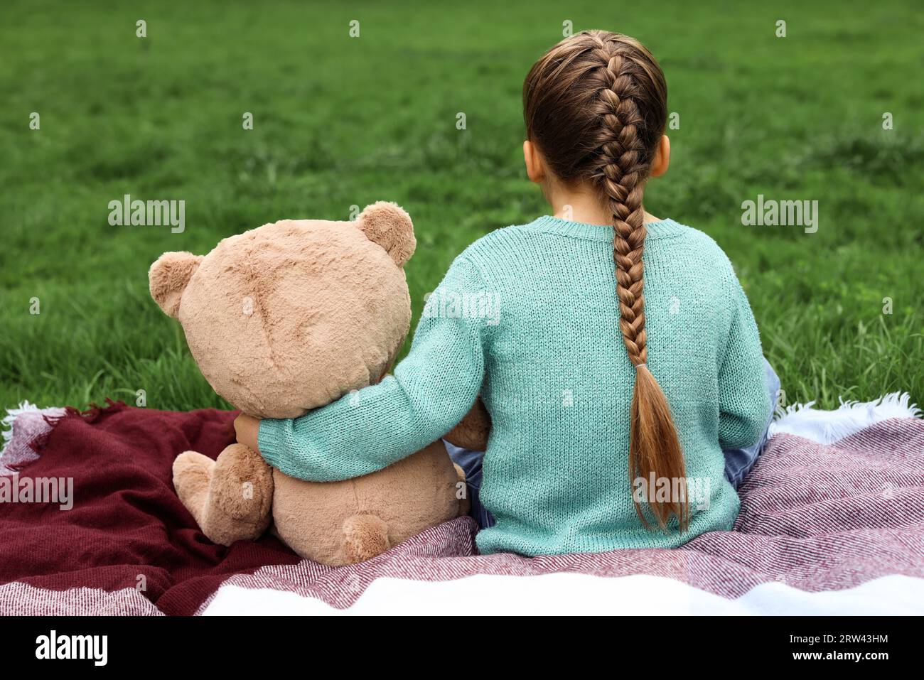 Child teddy back view hi-res stock photography and images - Alamy