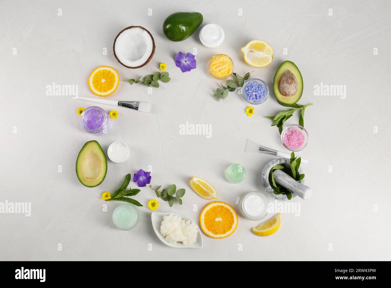 Frame made of homemade cosmetic products and fresh ingredients on light ...