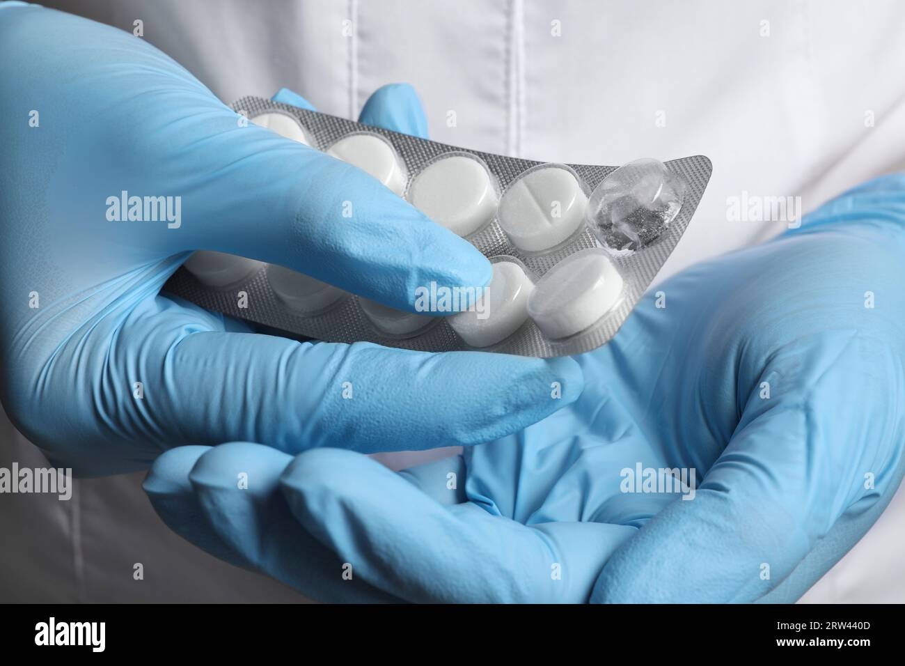 Hands taking pill from hi-res stock photography and images - Alamy