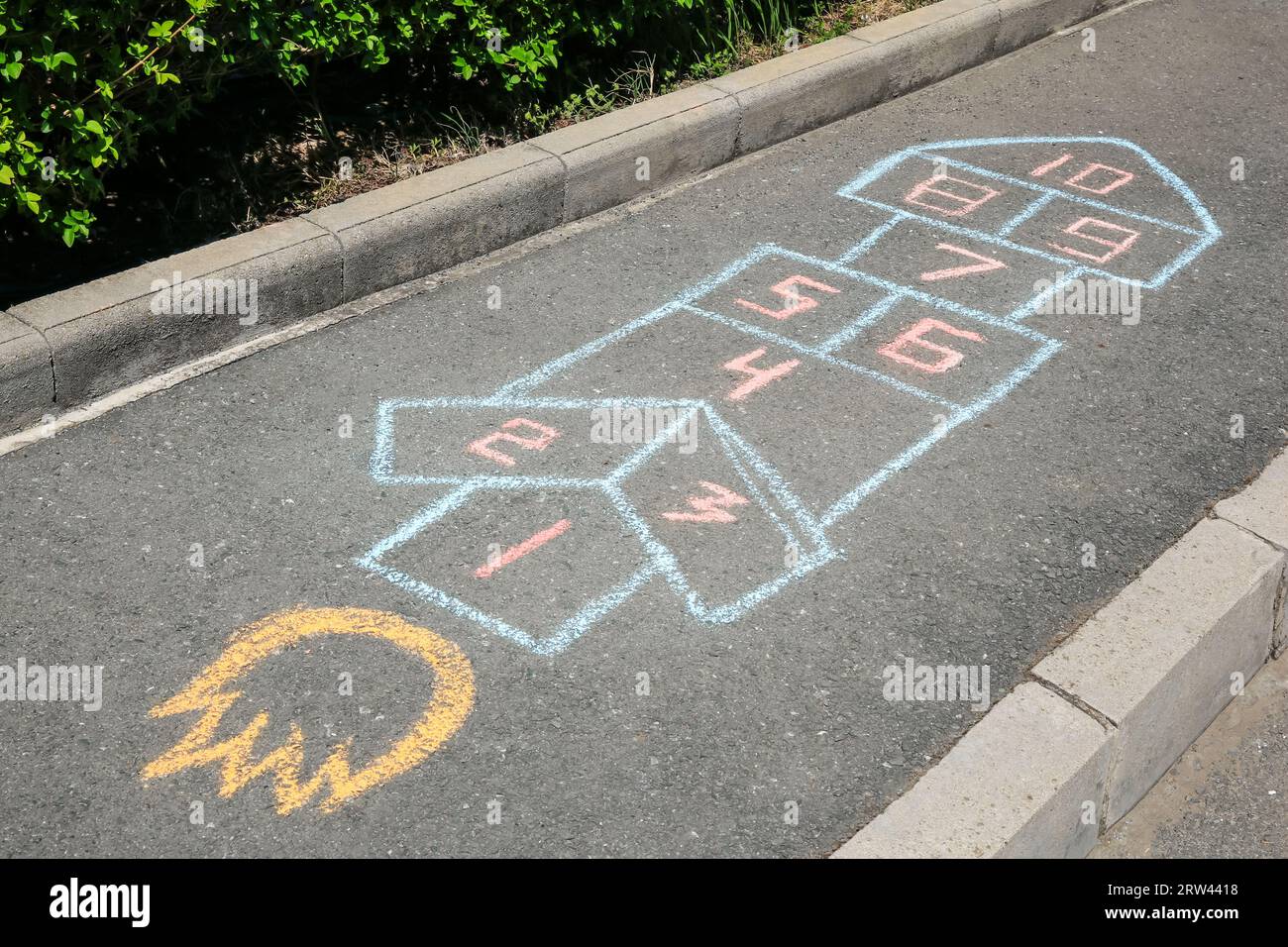 Hopscotch drawn with colorful chalk on asphalt outdoors Stock Photo - Alamy