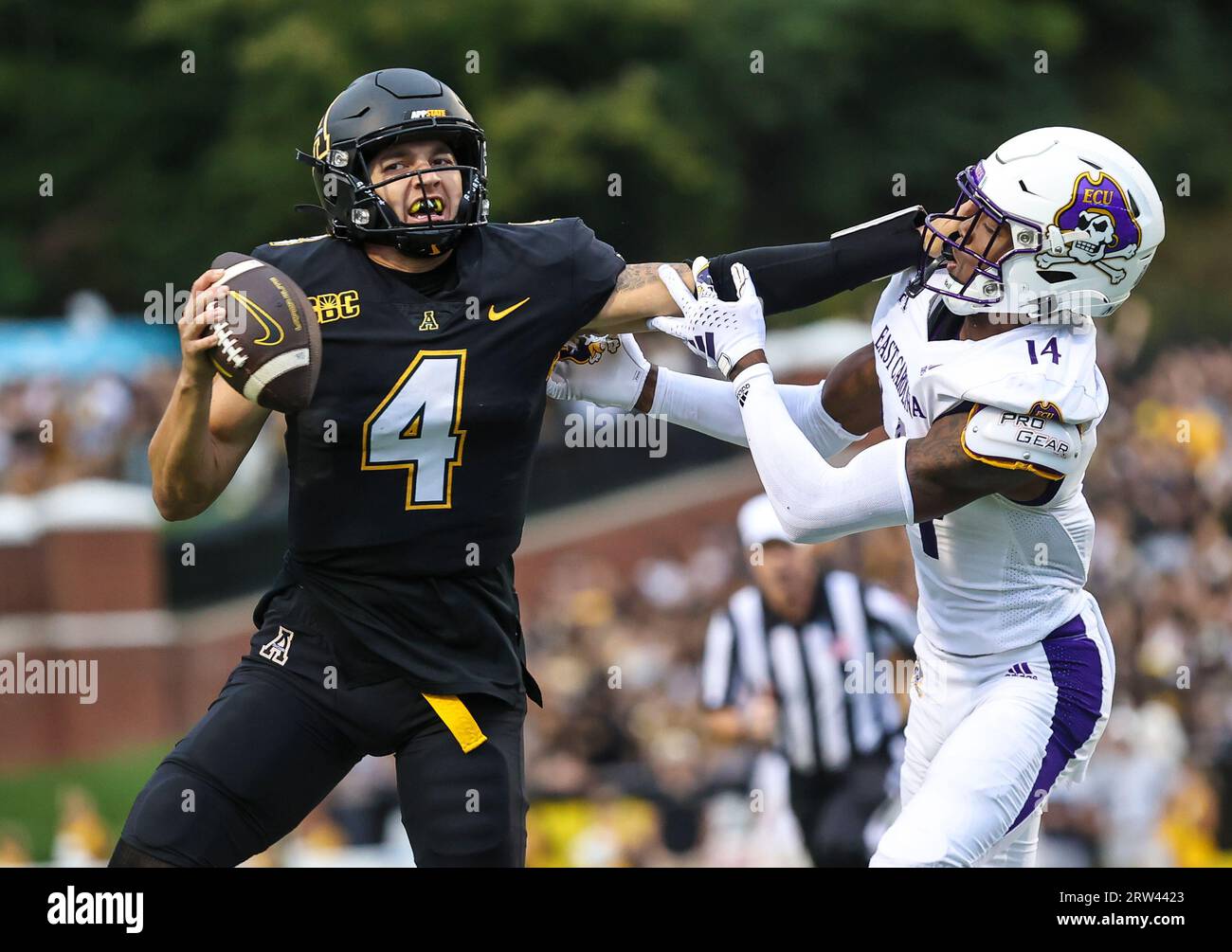 September 16,2023: Appalachian State junior Joey Aguilar (4) stiff arms ...