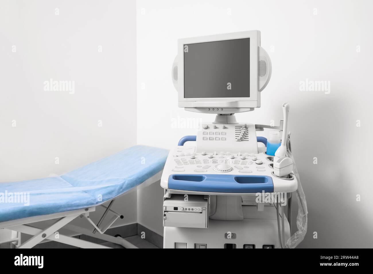 Ultrasound machine and examination table in hospital Stock Photo - Alamy