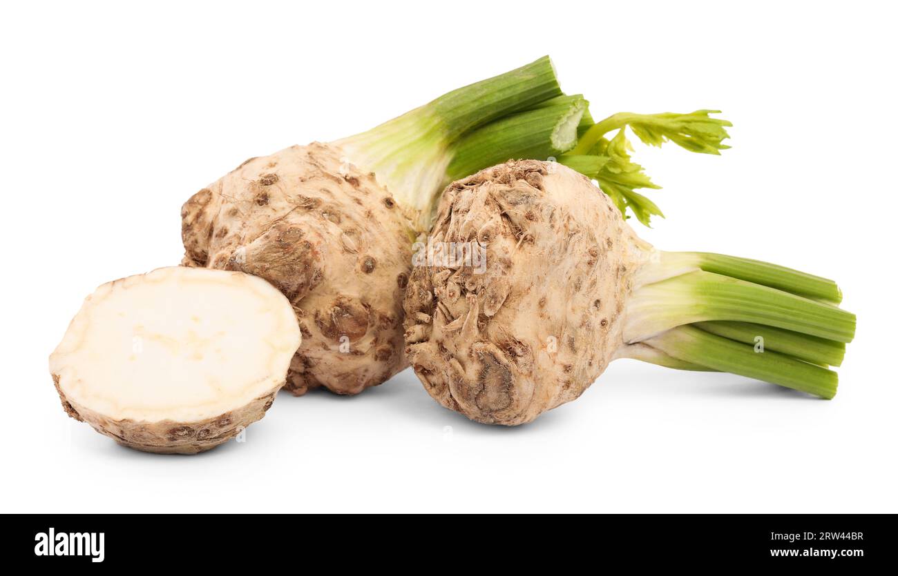 Whole and cut celery roots isolated on white Stock Photo - Alamy
