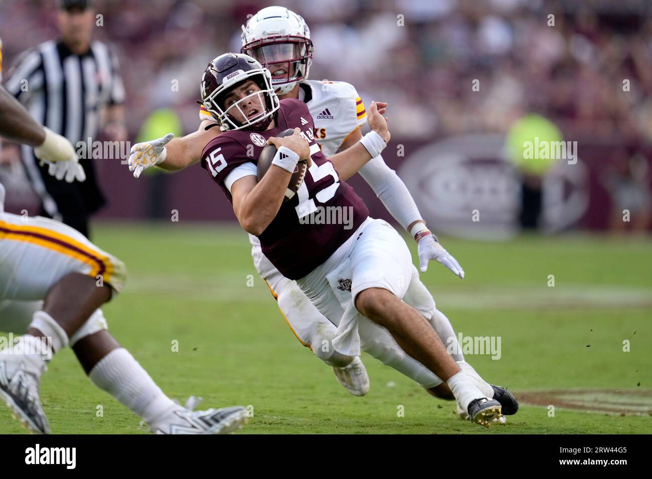 Texas A&M quarterback Conner Weigman (15) is chased down out of the ...