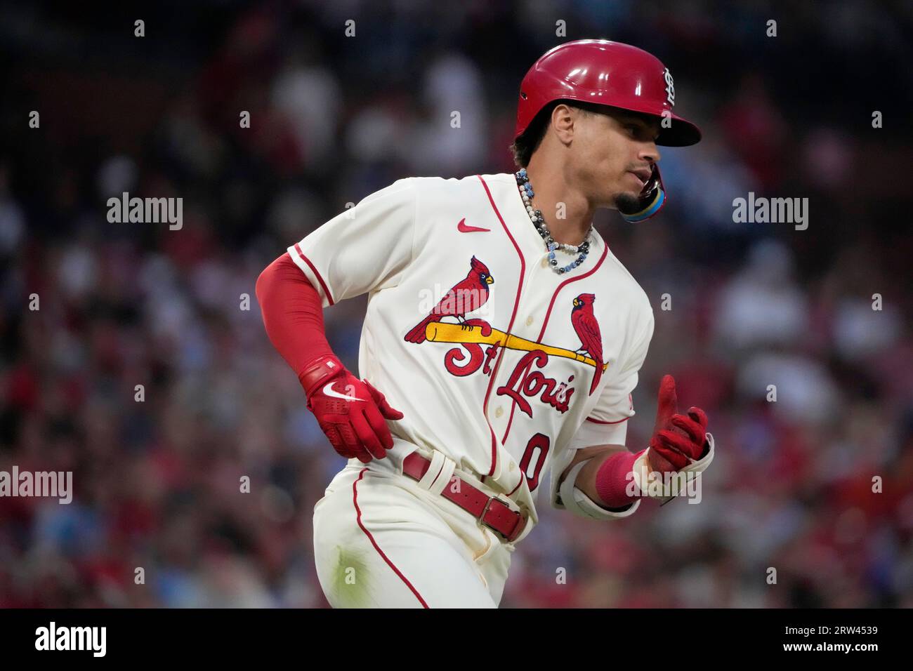 St. Louis Cardinals' Masyn Winn singles during the third inning of a ...