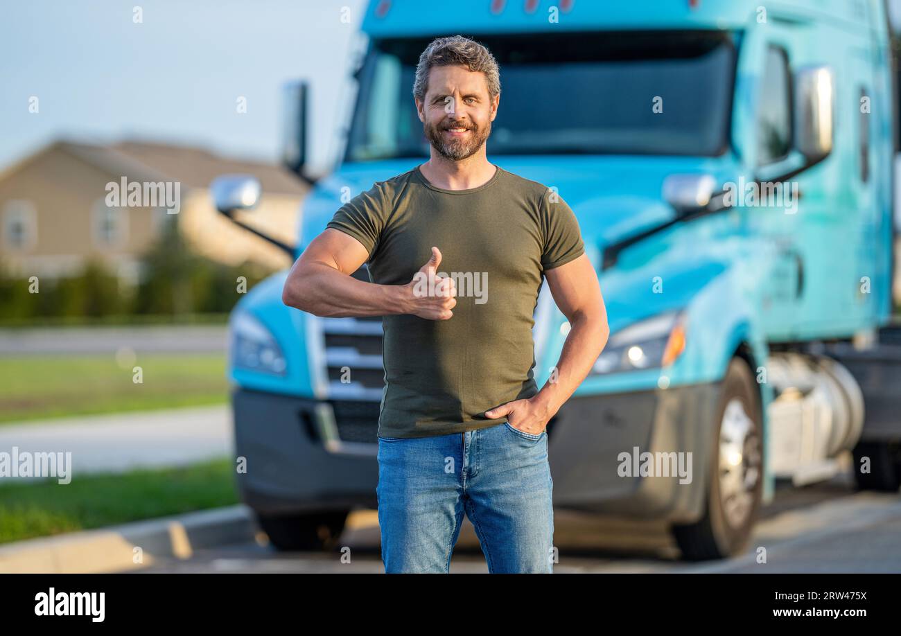 Semi trucks vehicle. Trucking owner. hispanic man posing in front of ...
