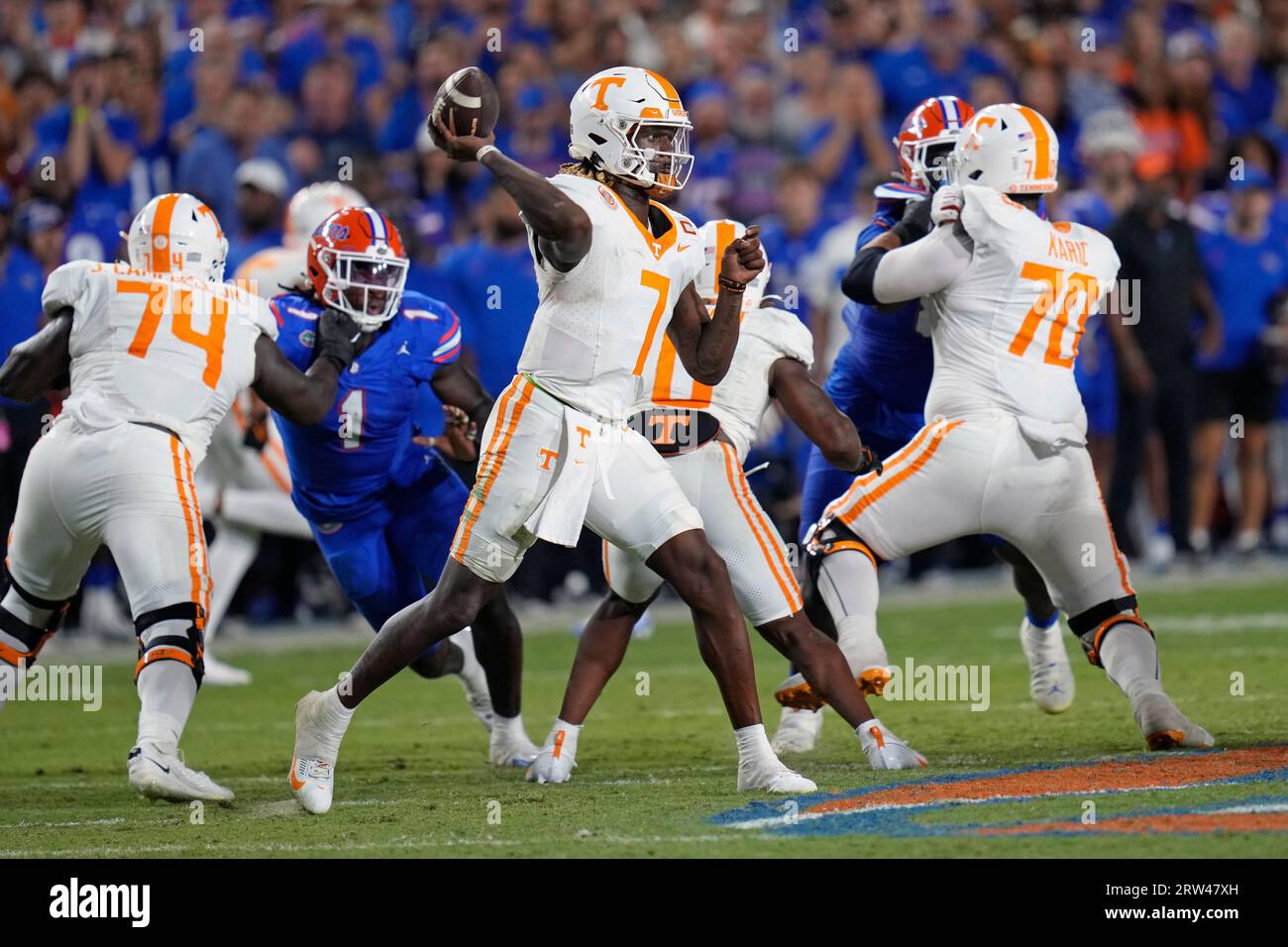 Tennessee quarterback Joe Milton III (7) throws a pass as he is rushed ...