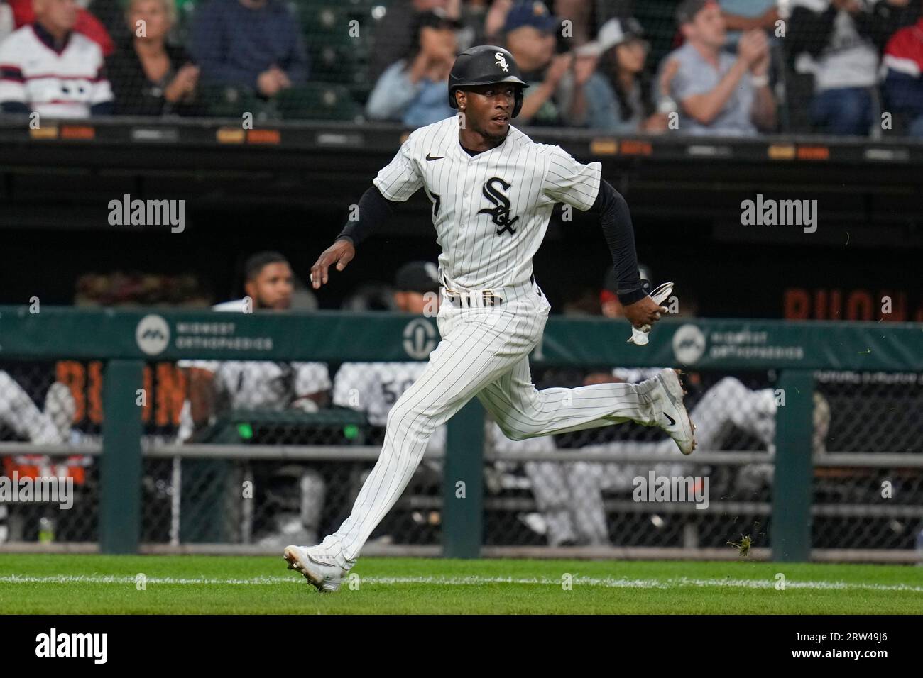 Chicago White Sox's Tim Anderson runs to home to score on a single from ...