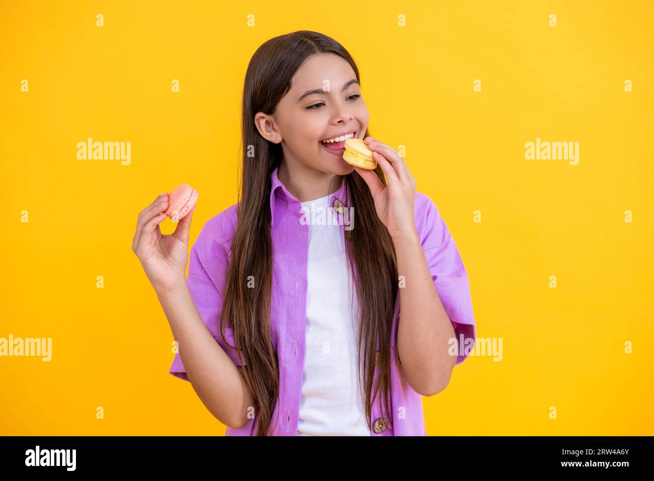 french cookie of macaroon. girl enjoying flavor of macaron. girl with ...
