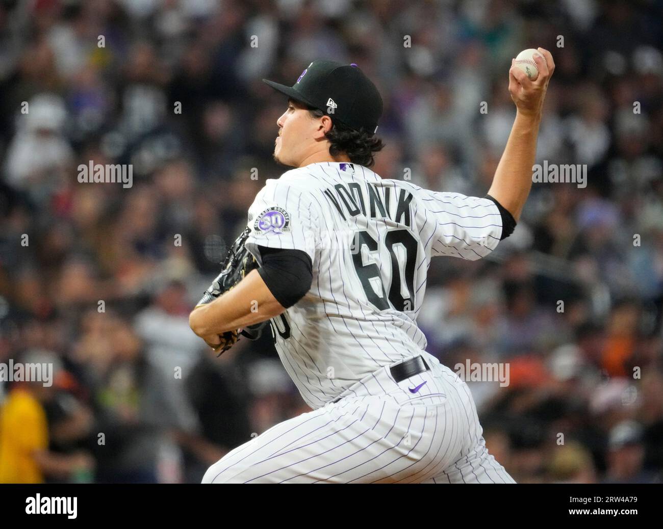 Colorado Rockies relief pitcher Victor Vodnik throws to the plate ...