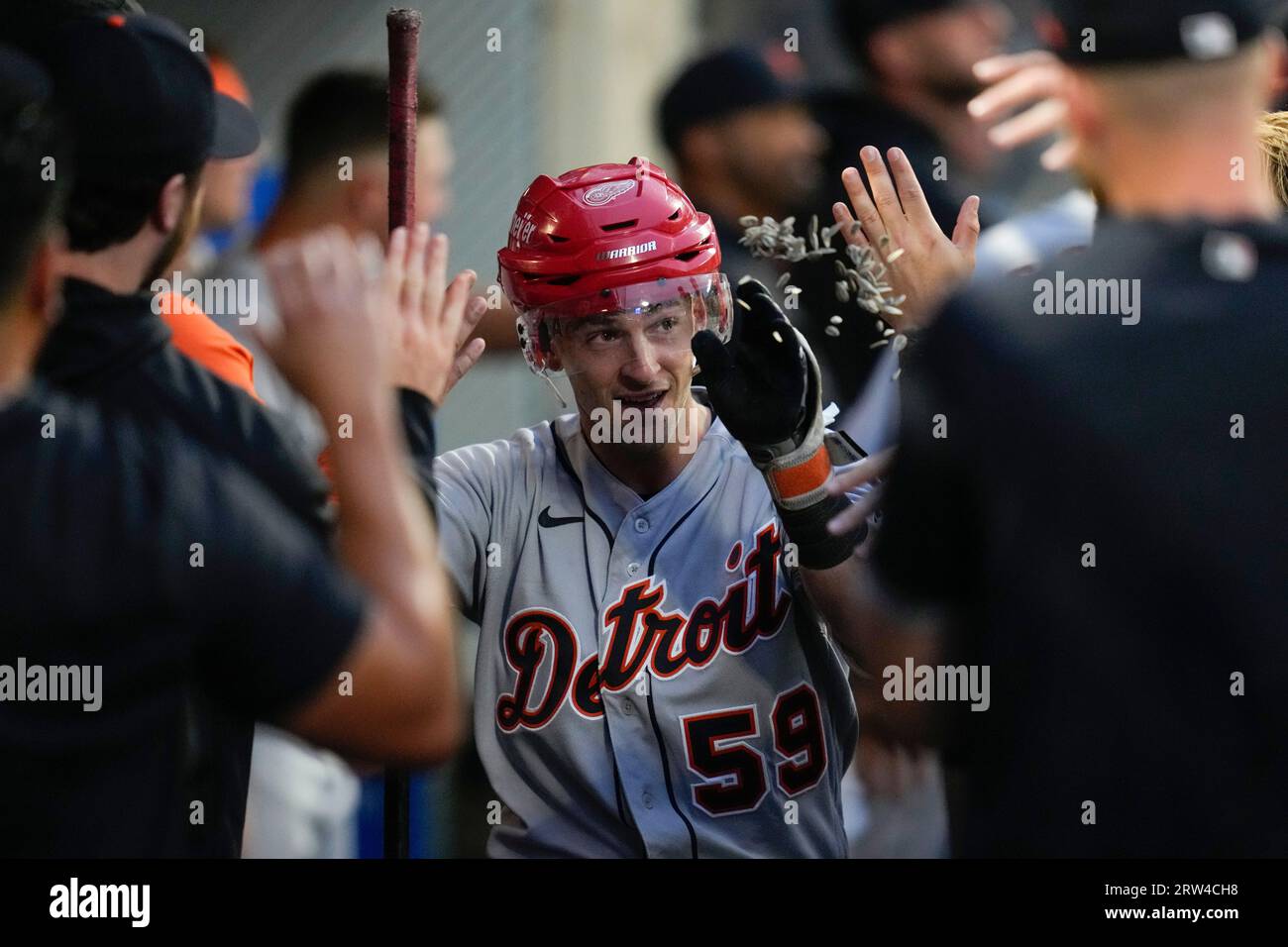 Detroit Tigers' Zack Short (59) celebrates in the dugout after hitting ...